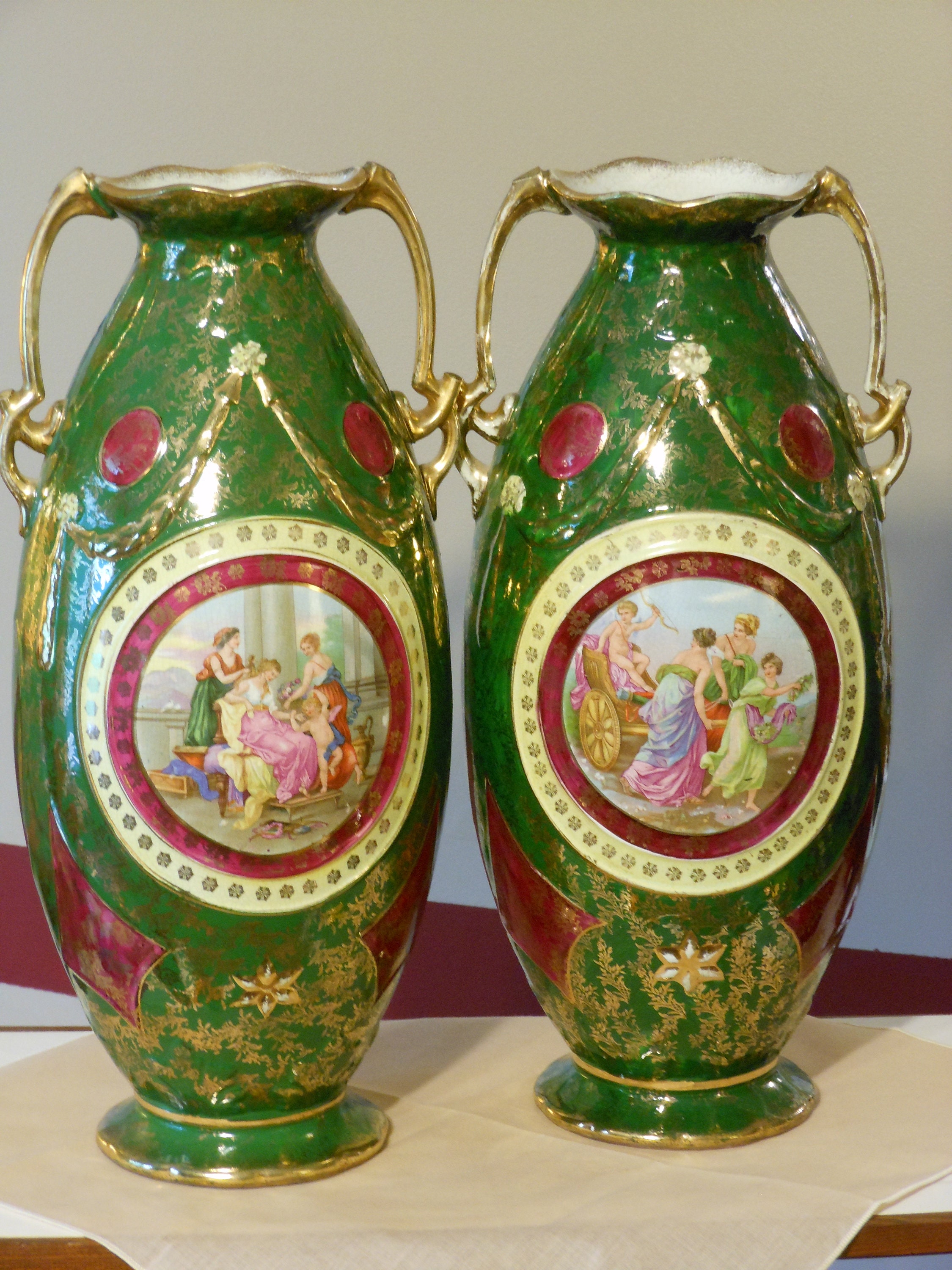 Two Vintage Tall Green Classic-Themed Vases