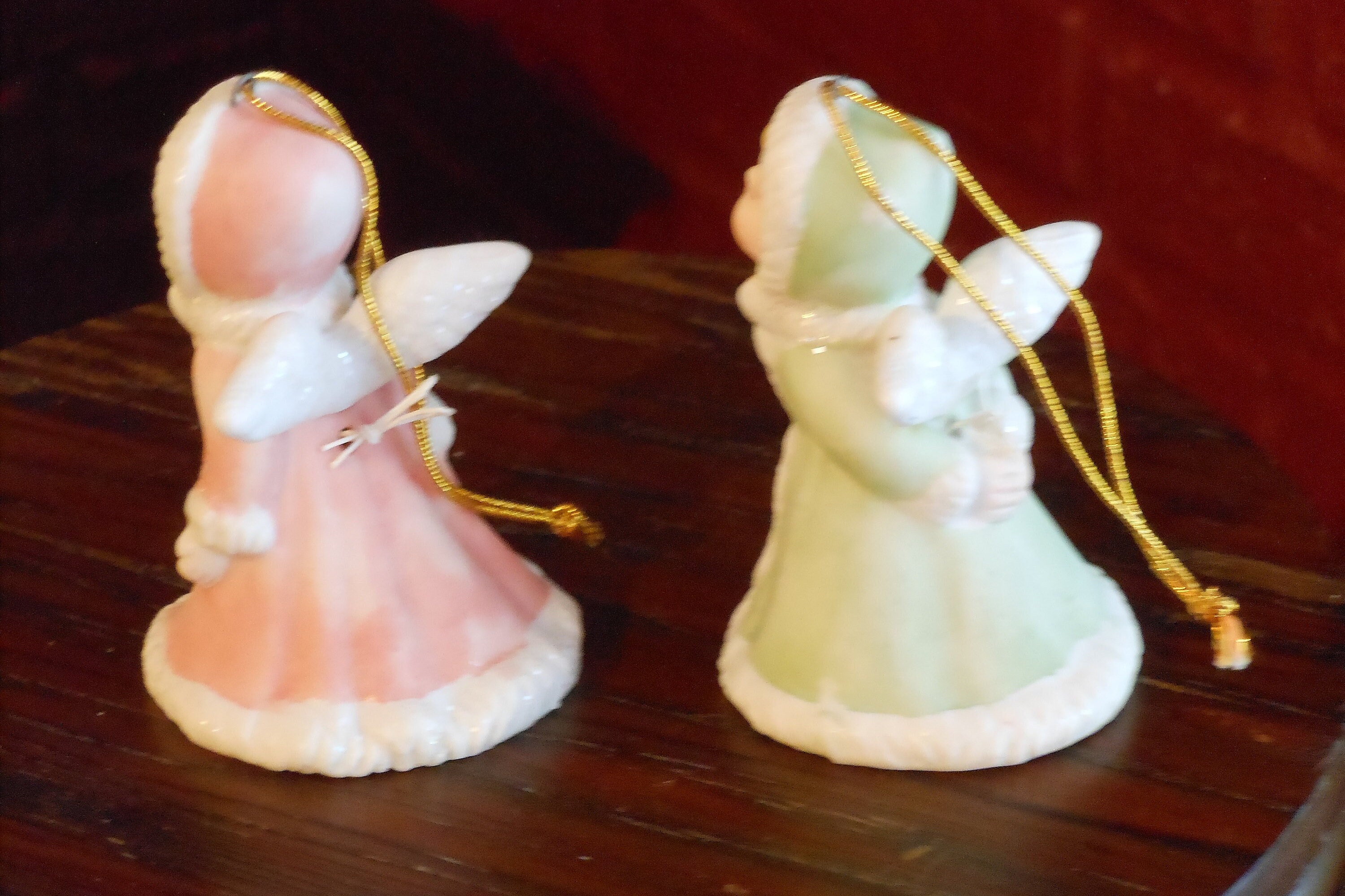 Two Matching Bisque Porcelain Angel Bell Christmas Ornaments