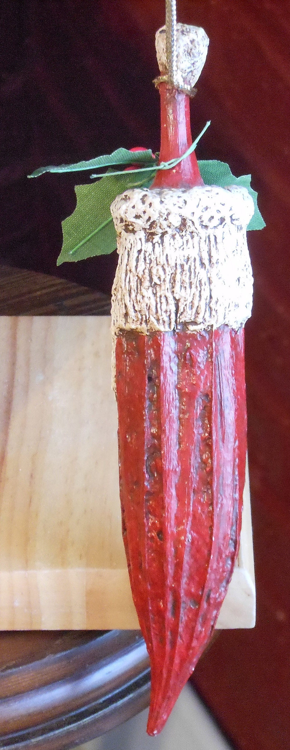 Elongated Plastic Santa Ornament