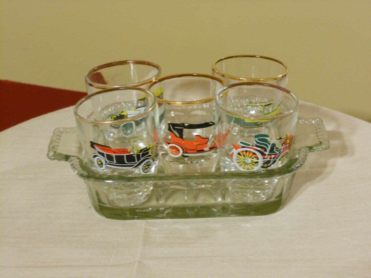 Set Of Five Antique Car Shot Glasses In A Glass Tray