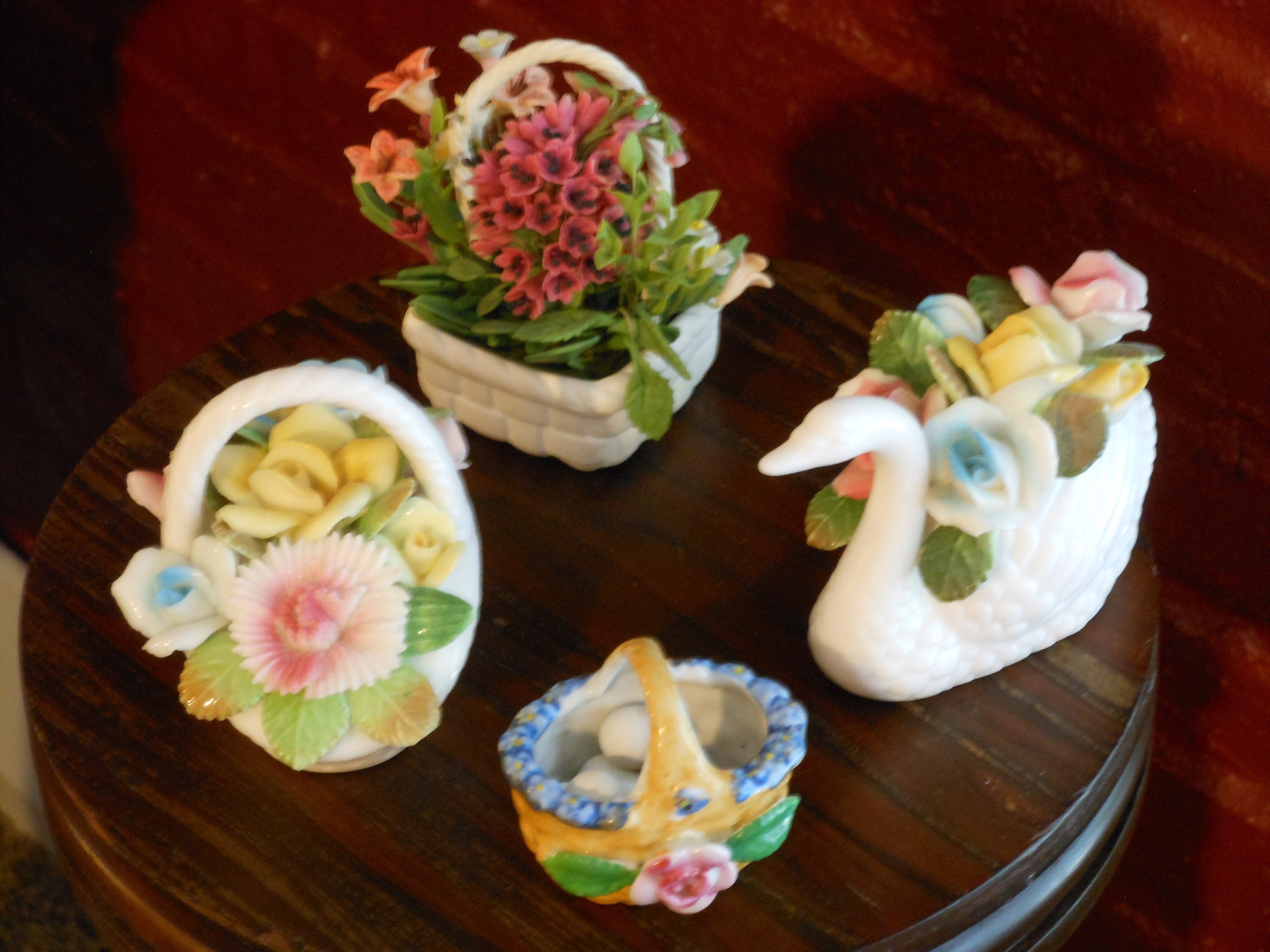 A Collection of Four Ceramic Baskets