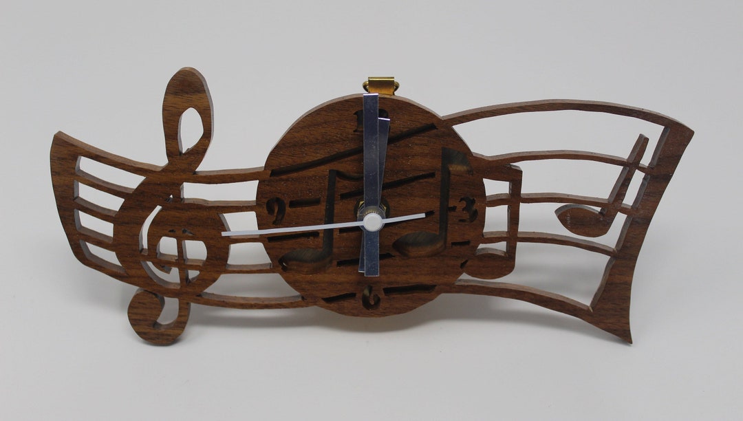 Music Clock. Displays Musical Notes and Has Battery Powered Clock ...