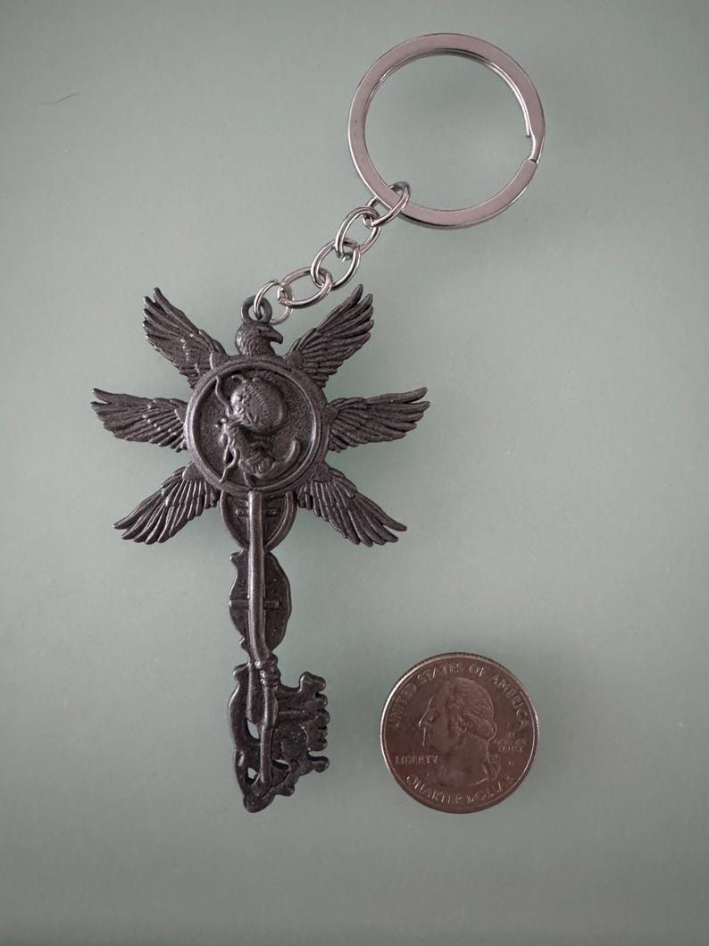 Six Winged Keychain - Etsy