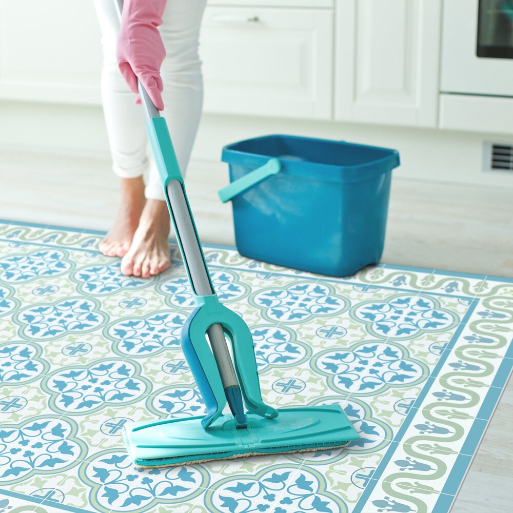 Yellow vinyl floor area rug with graphic leaves design in | Etsy