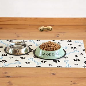 Dog Placemat / Pet Mat. Dog Bowl Mat, Paws and Bones Illustration. Pet ...