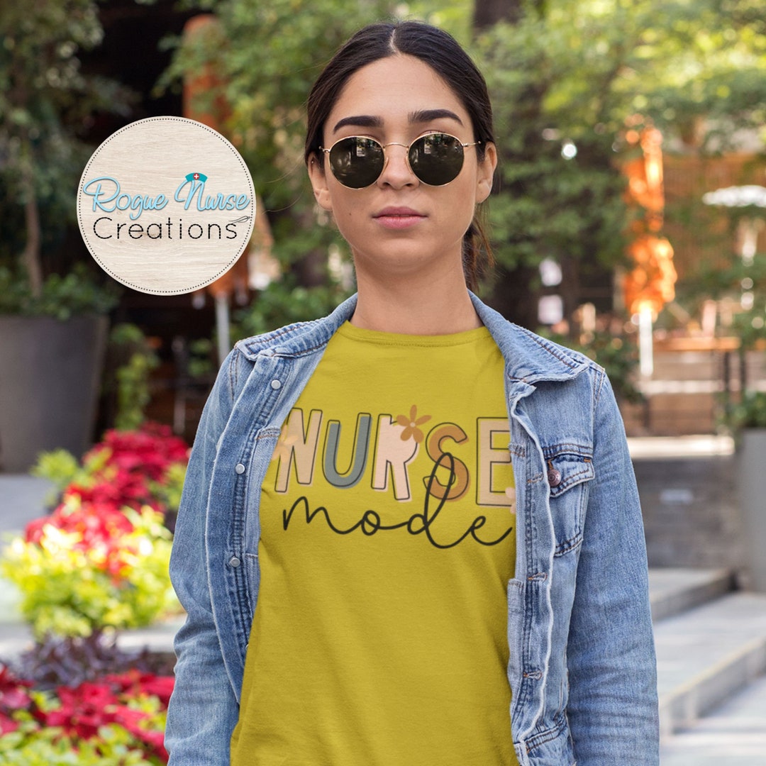 Nurse Mode Graphic T-shirt, Neutral Tone Nurse With Flowers T-shirt ...