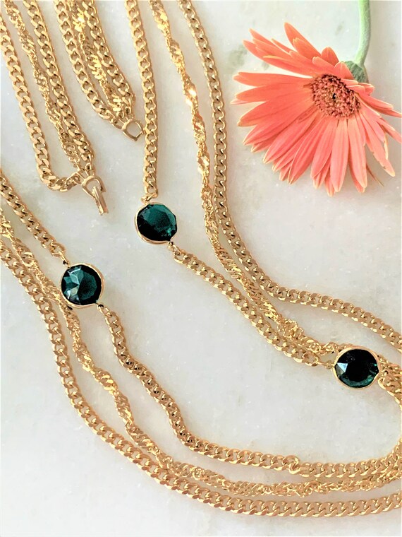 Faceted Emerald Open Back Bezels on Gold Tone 3 Row L… - Gem