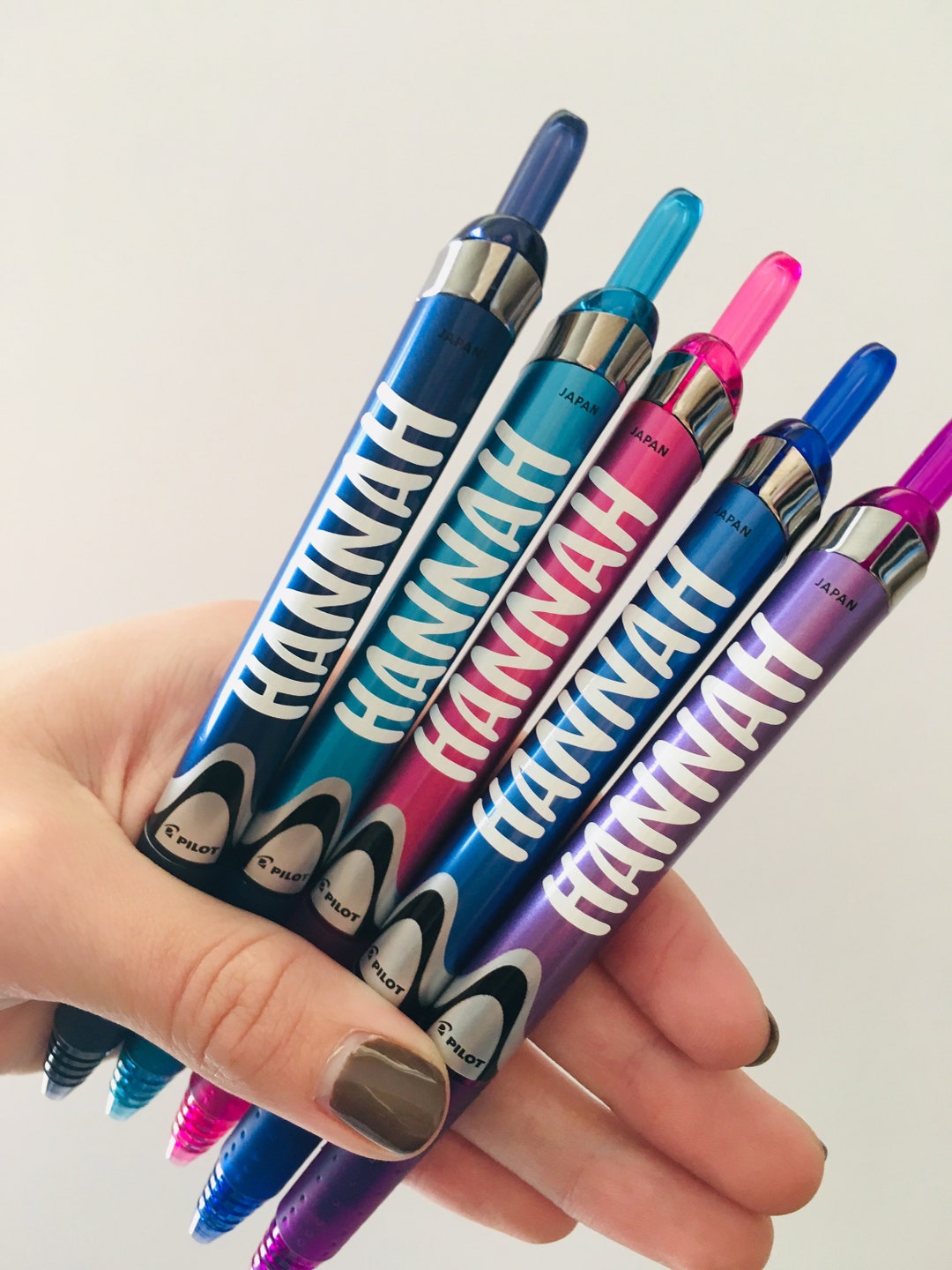 Pens with names on store
