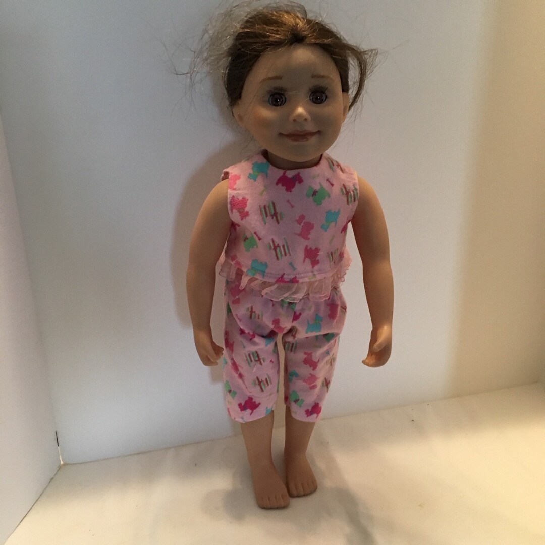 DN43 18 Doll Pyjama Outfit: Fun Multi Scotti Dog a Pink Background ...