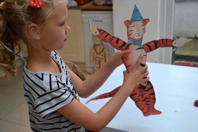 A tiger cut out and make puppet kit. | Etsy