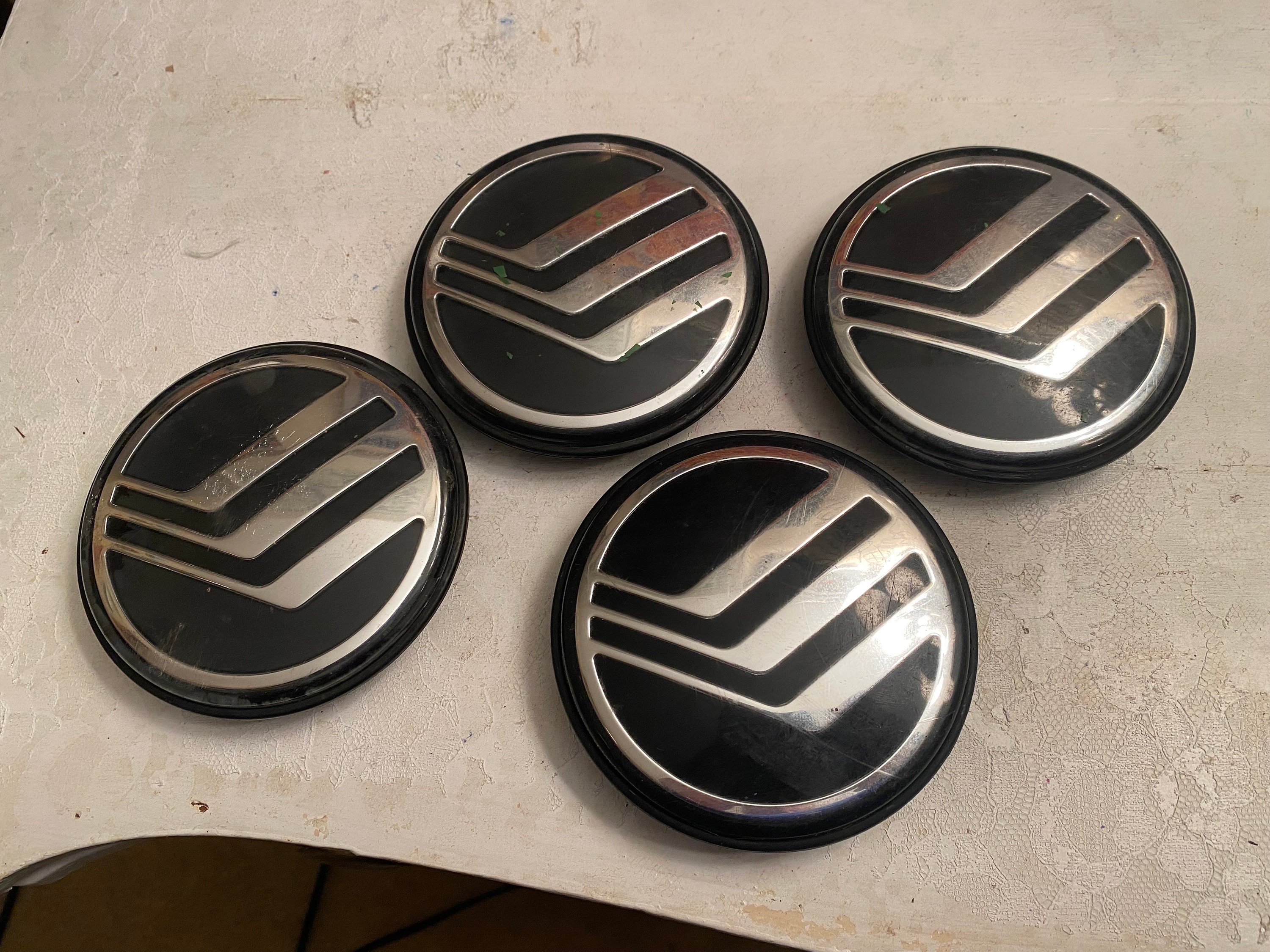 Mercury Marquis 2000s logo hubcap center