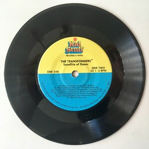 The Transformers: Satellite of Doom 7' Vinyl Record / 24 Page Book, Kid ...