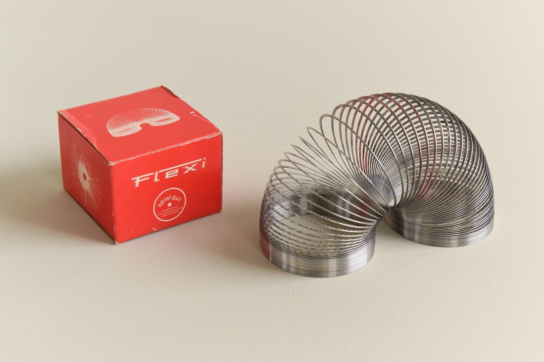 Vintage Boxed West German Flexi Metal Slinky Toy - Etsy