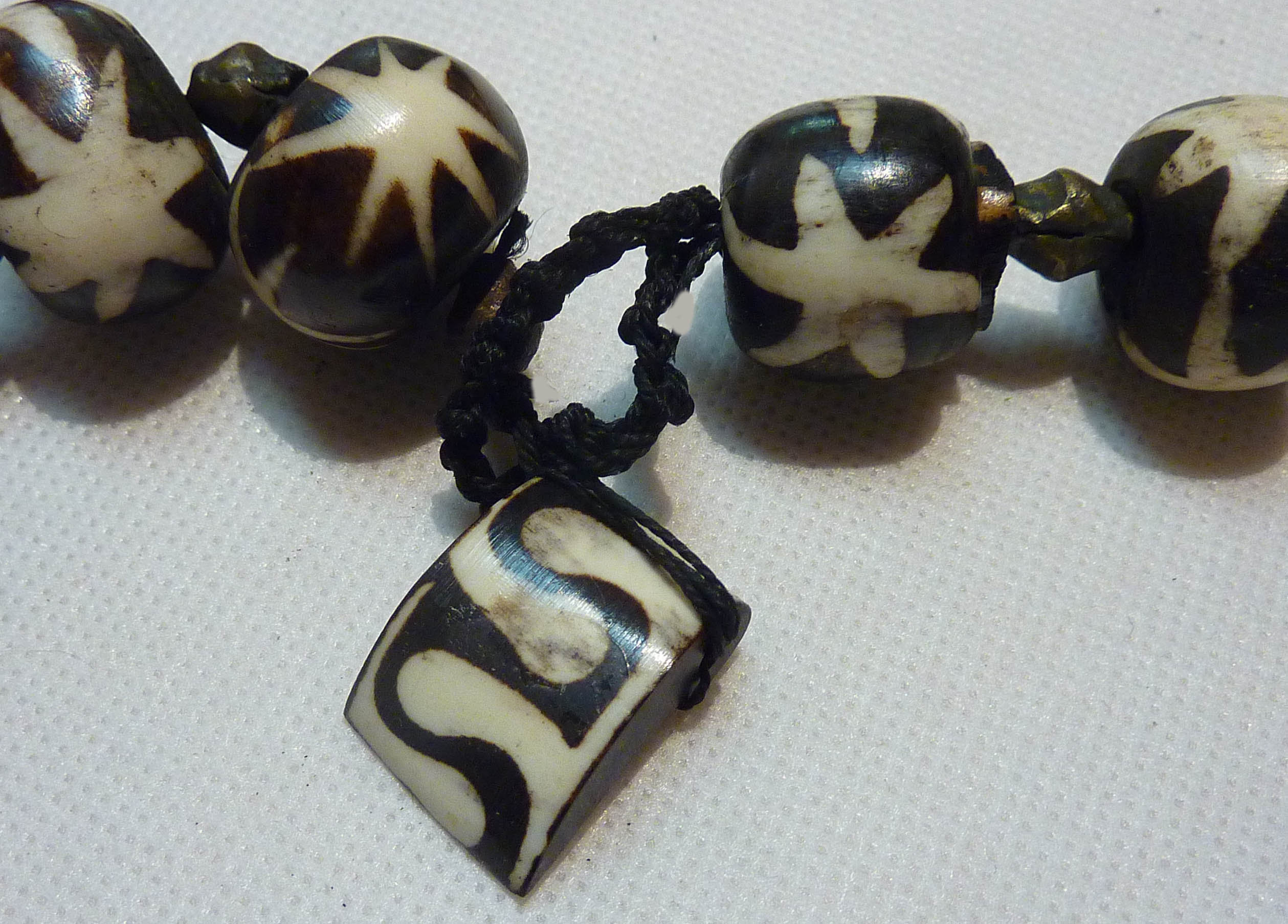 Batik Cow Bone and Old Ethiopian Brass Bicones 30