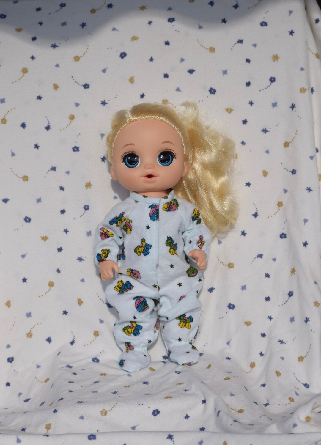 Cute Light Blue Flannel Sleeper in Baby Toy Print Fits 13-inch Baby ...