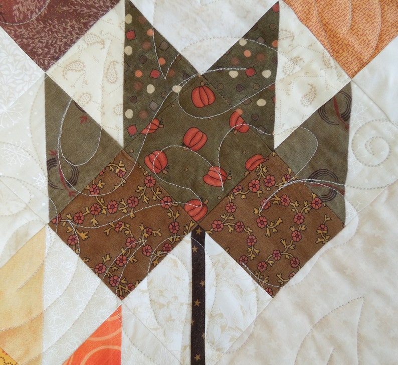 Falling Leaves is a Patchwork Quilt Depicting a Tree Decked Out in ...