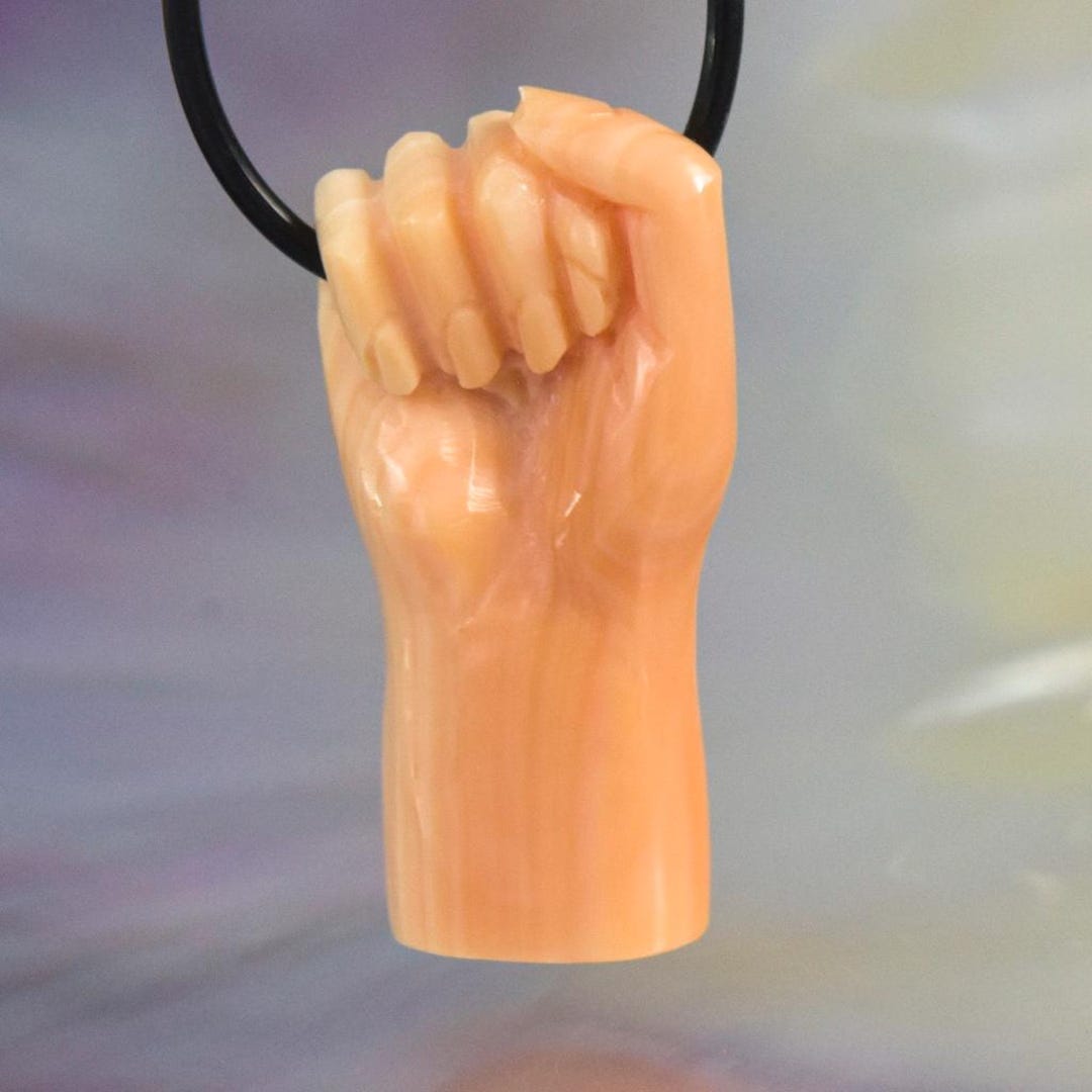 Raised Fist Hand Mano Gesture Amulet Charm Apricot Trumpet Shell ...