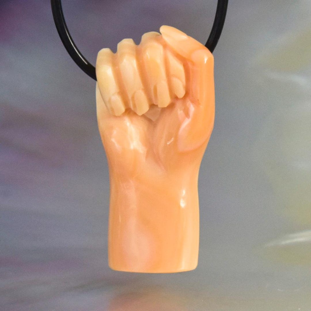 Raised Fist Hand Mano Gesture Amulet Charm Apricot Trumpet Shell ...