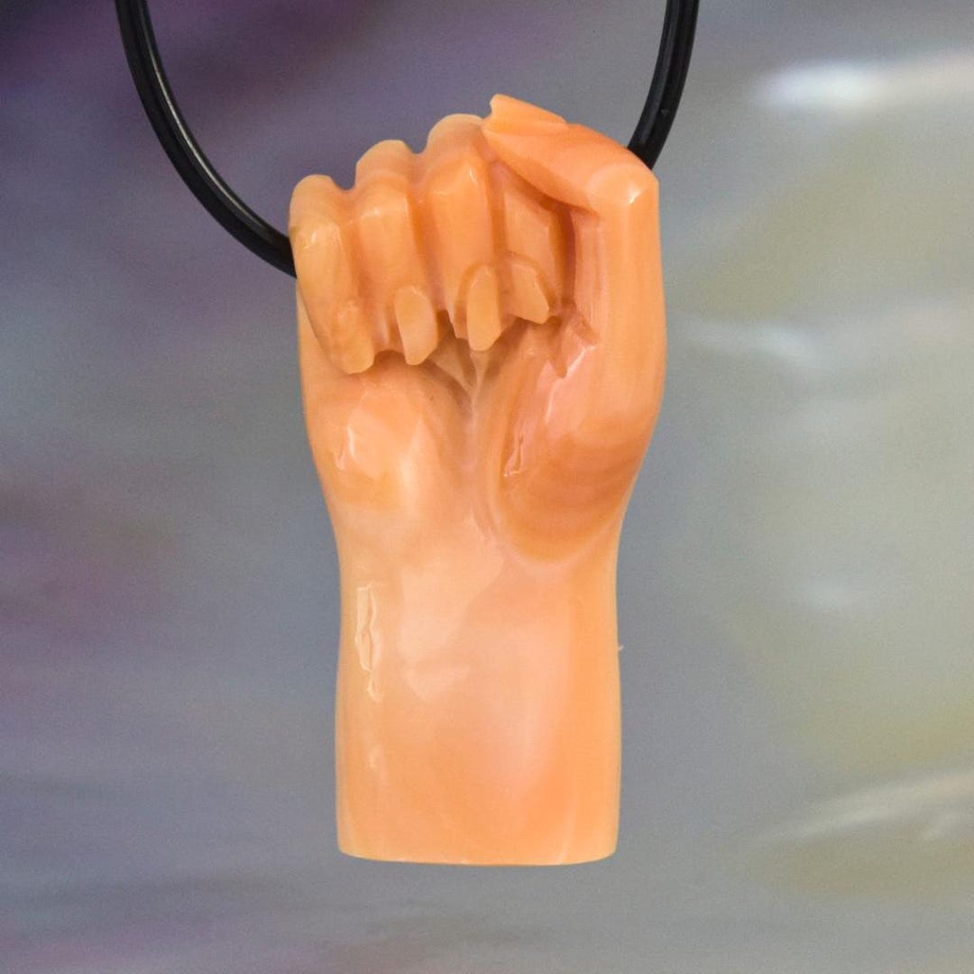 Raised Fist Hand Mano Gesture Amulet Charm Apricot Trumpet Shell ...