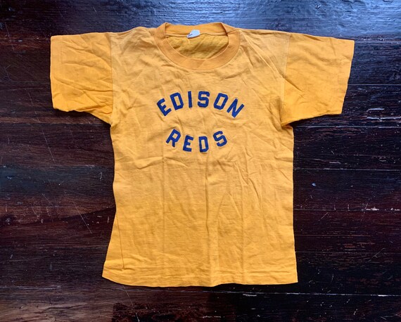 vintage 50s gold Champion running man Edison Reds blu… - Gem