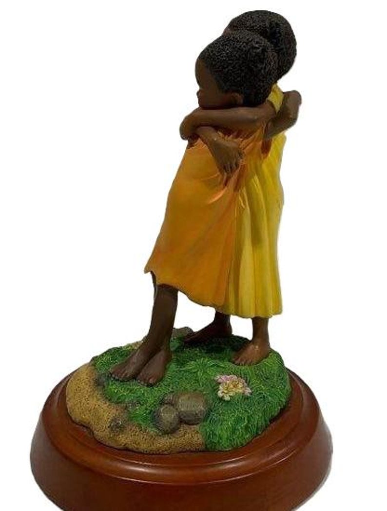 Thomas Blackshear's Ebony Visions Double Hug - Etsy