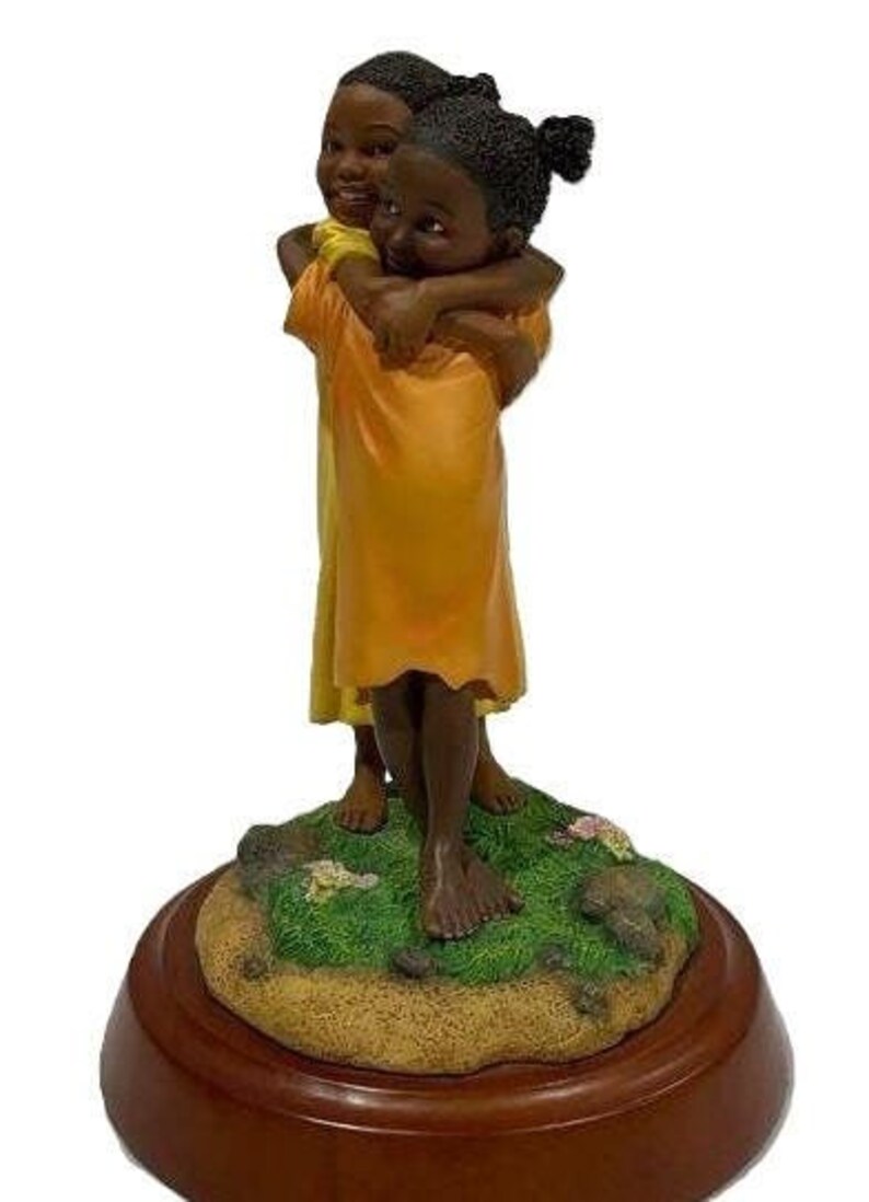 Thomas Blackshear's Ebony Visions Double Hug - Etsy