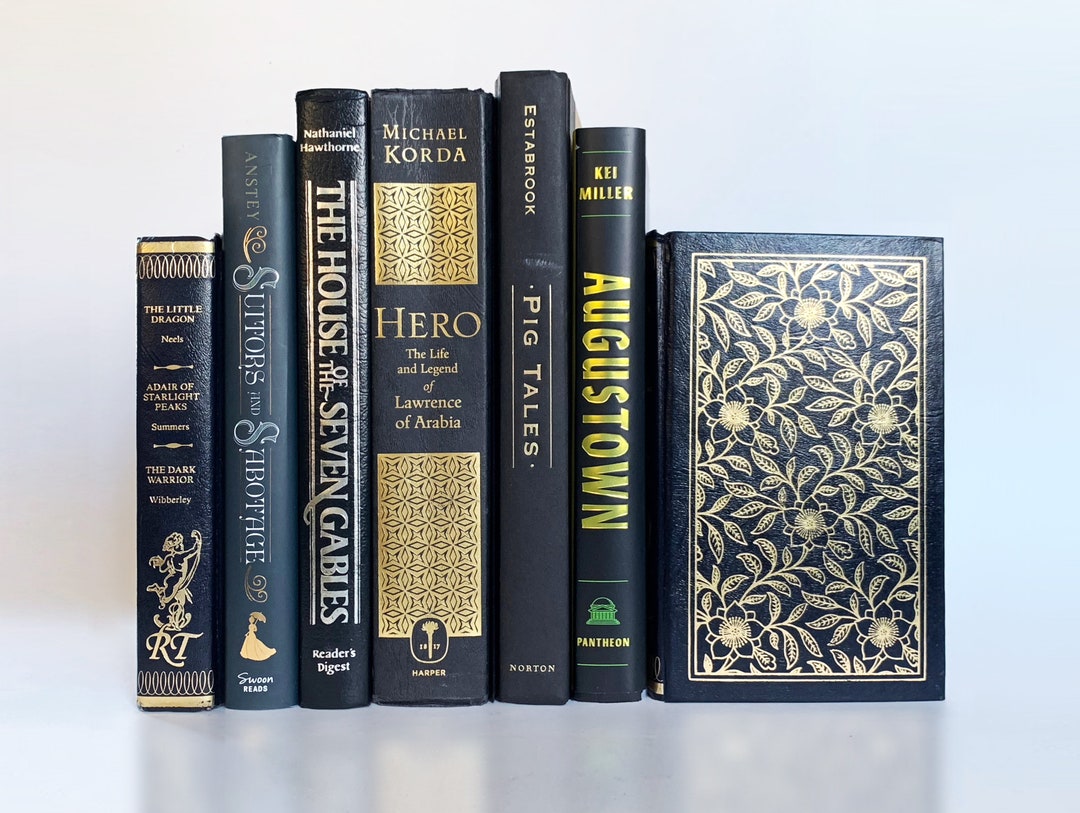 Sophisticated, Shimmering Classics: A Stack of Black, Gold & White ...