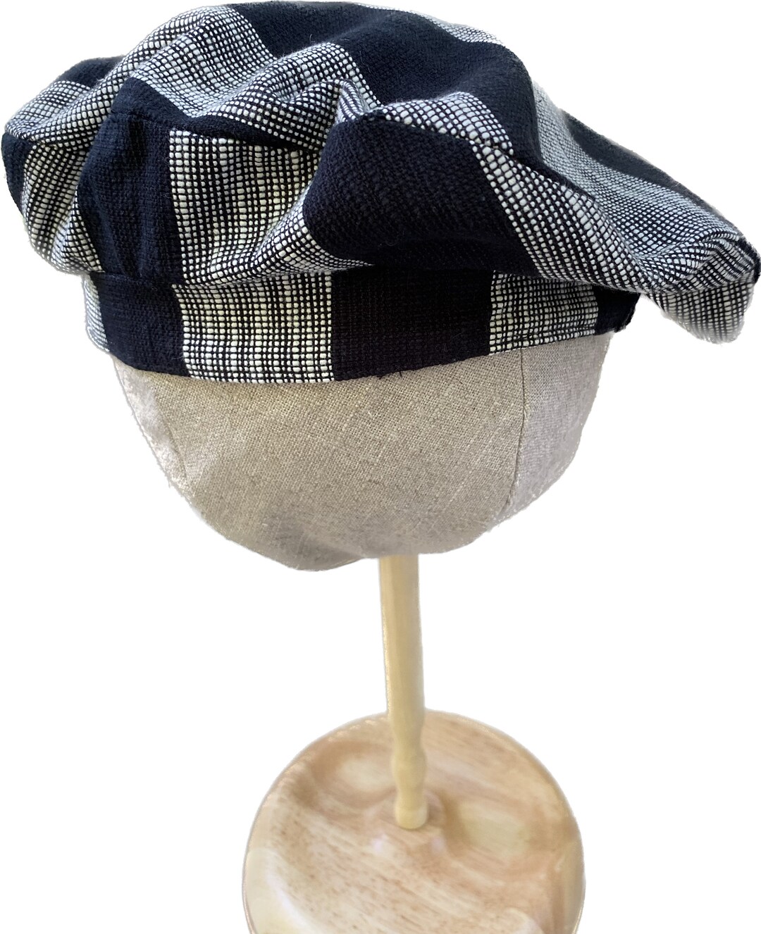 Black and White Striped Hat With Accents of Salmon-colored Canvas. One ...