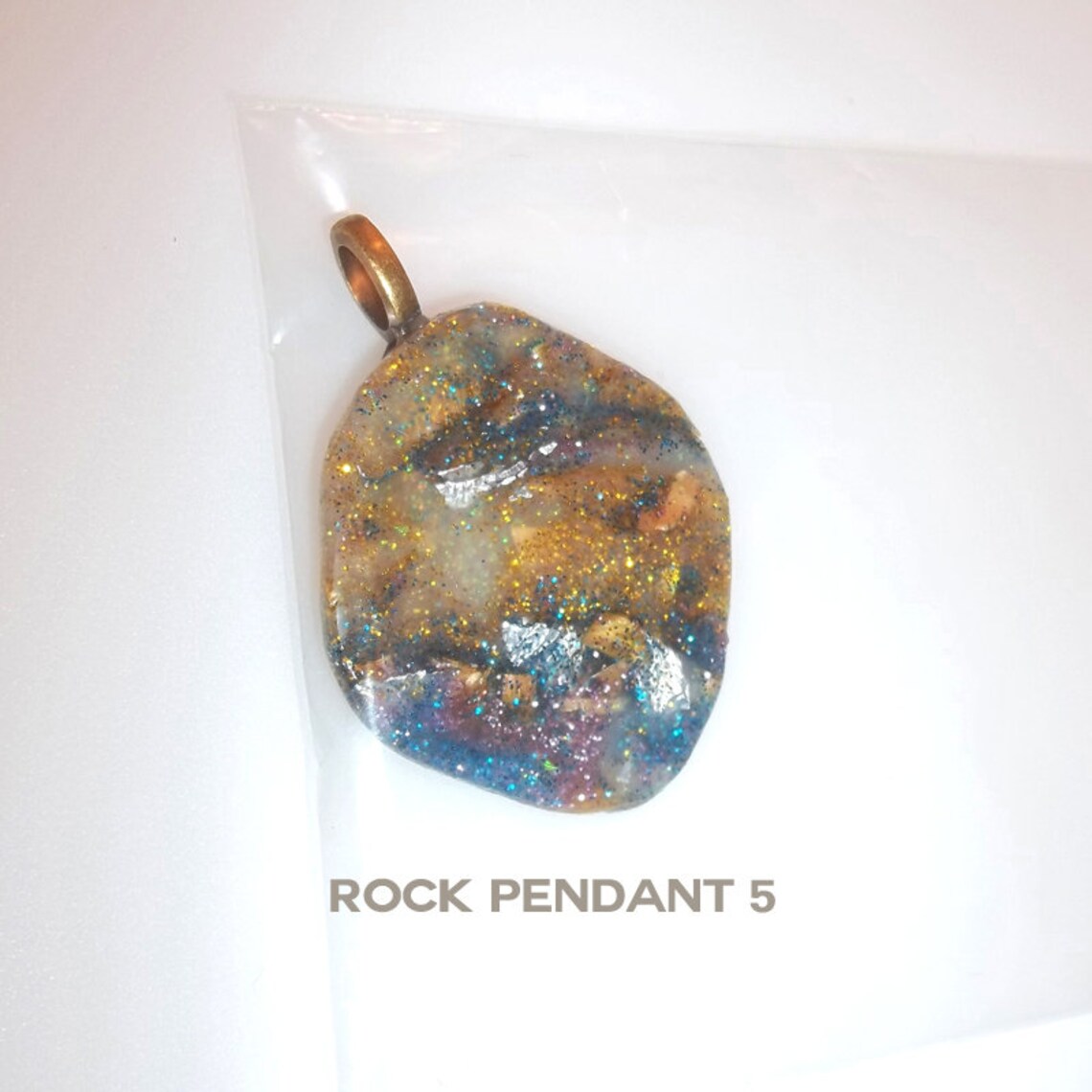 Handcrafted rock Pendants - Etsy