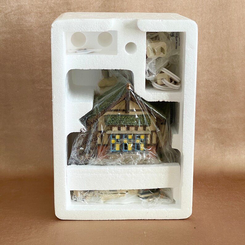 Dept 56 Dickens Village: Evan Hoyt Sponge Dealer Light up House - Etsy