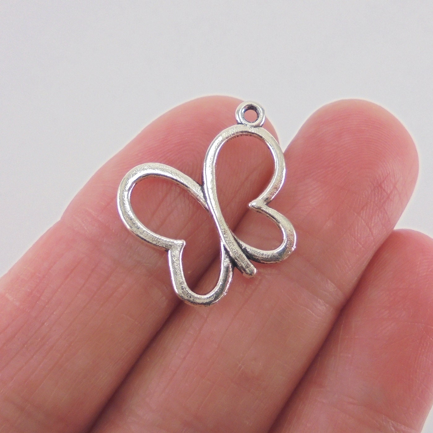 8 Butterfly charms 20x17mm antique silver finish | Etsy