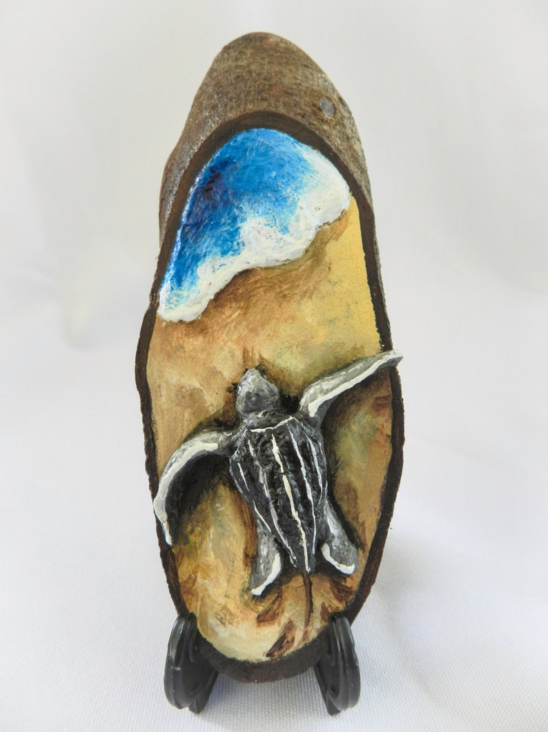 Recycled Paper Leatherback Sea Turtle Hatchling on a Rustic Wood Round ...