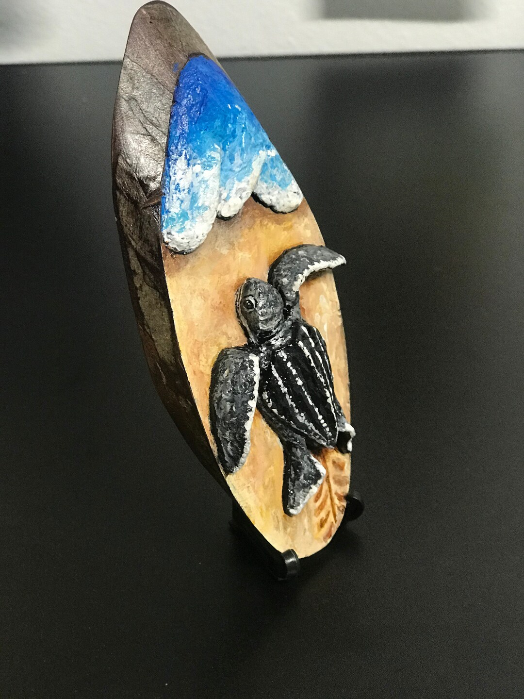 Recycled Paper Leatherback Sea Turtle Hatchling on a Rustic Wood Round ...