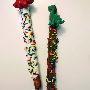 Chocolate Covered Pretzel Rods With Dinosaurs and Jimmies Kids Party ...
