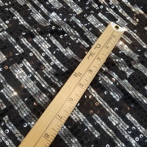 Striped Silver Sequence on Black Stretch Fabric Usable for Apparel ...