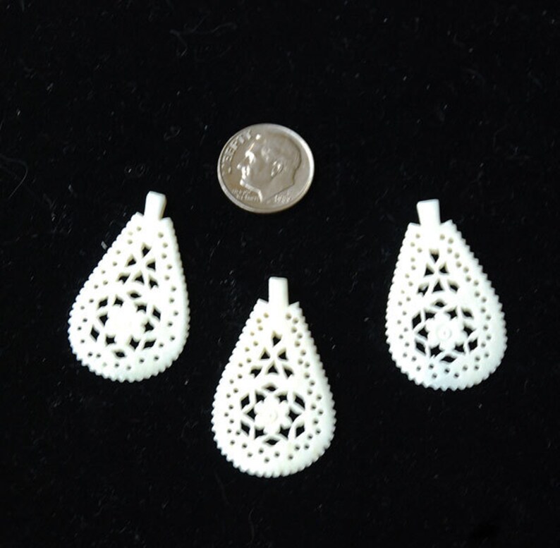 Carved Pierced Bone Pendants White or Black 2 handcrafted | Etsy