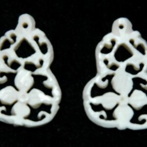 Exotic Bone Pendants Carved and Pierced Pair - Etsy