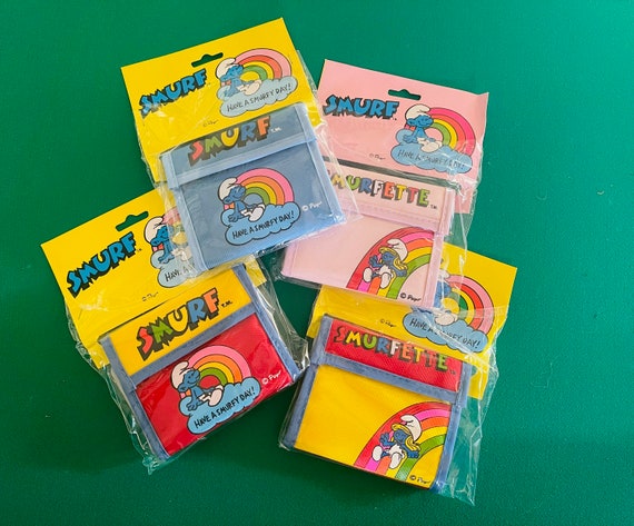 Original 1981 Smurf and Smurfette Wallets in original… - Gem