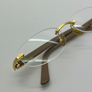 Cartier Rimless C Decor Brushed Gold Composite Eyeglass Frames DEMO ...