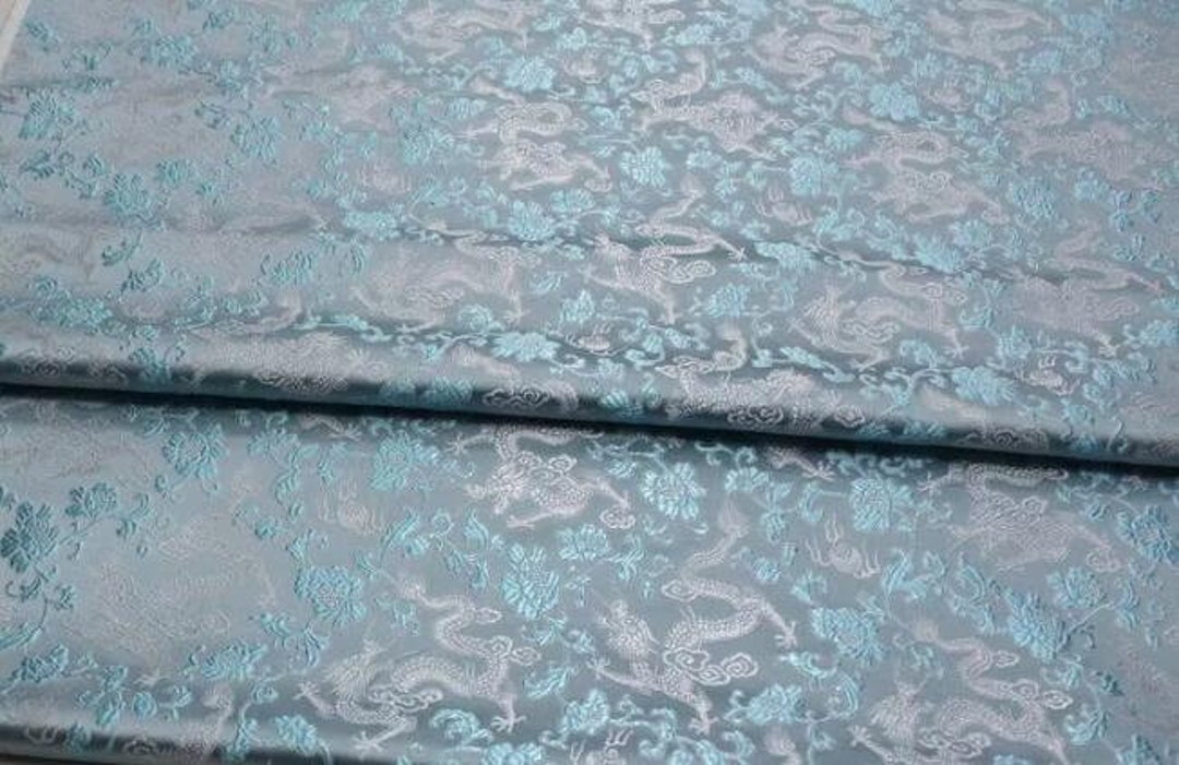 Light Blue Color Brocade Fabric With Chinese Silver Dragon Pattern ...