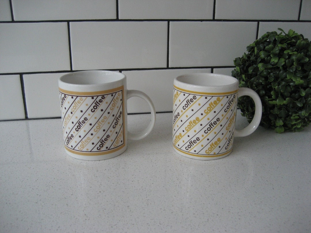 Pair Vintage Coffee Cups Retro Graphics Font Angle Design 1983 & 1990 ...