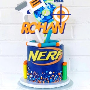 Dart Gun Cake Topper - Blue Camo and Orange Party Decorations - Gun War ...