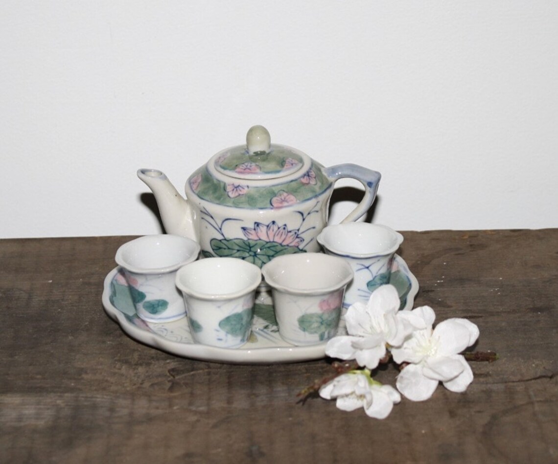 Seven Piece Child's Porcelain Lotus Flower Tea Set With Pot, Tray, and ...