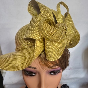 Breathtaking Gold Hat, Boasting a Beautifully Simple Design Accentuated ...