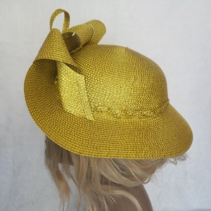 Breathtaking Gold Hat, Boasting a Beautifully Simple Design Accentuated ...