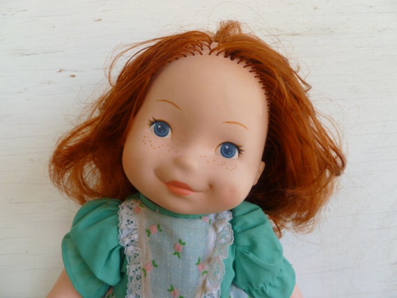 Baby doll with red hair and blue eyes store