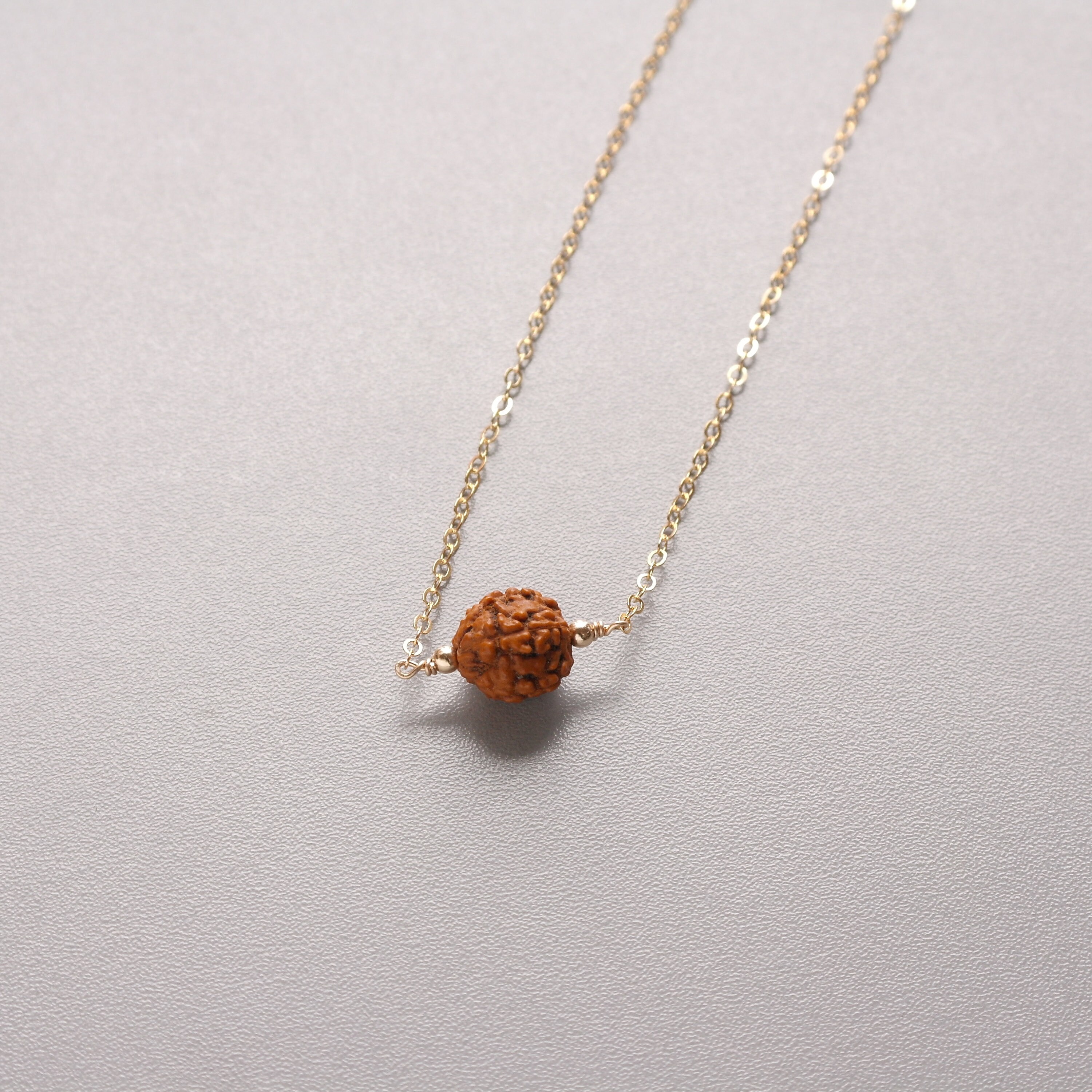 Gold chain with single rudraksha store