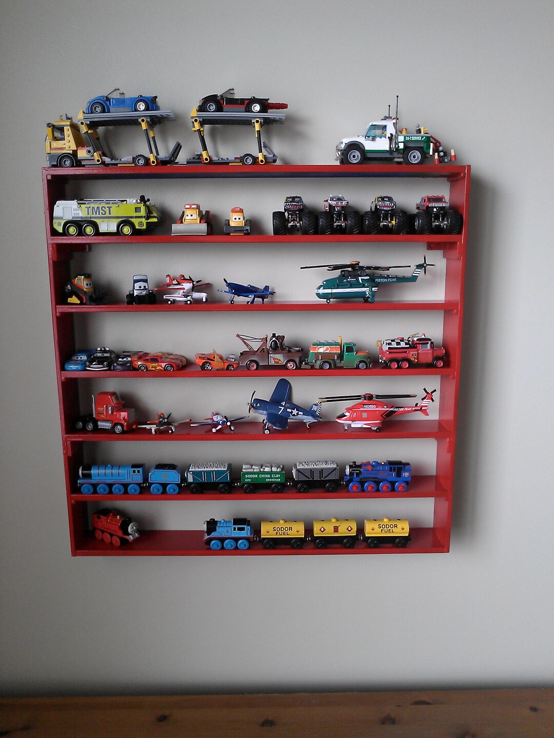 Planes Fire and Rescue, Cars, Monster Trucks, Legos, Wall Display Rack ...