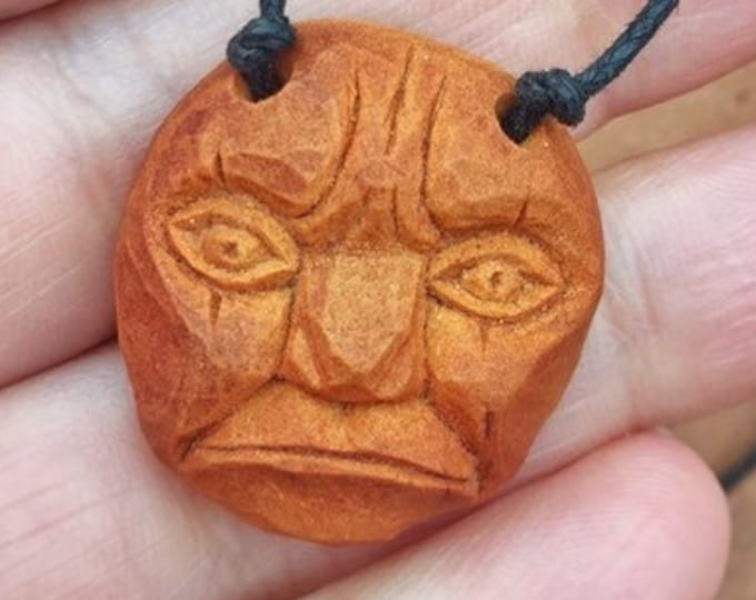 Hand Carved Avocado Stone Necklace | Angry Face Grumpy Man Face ...