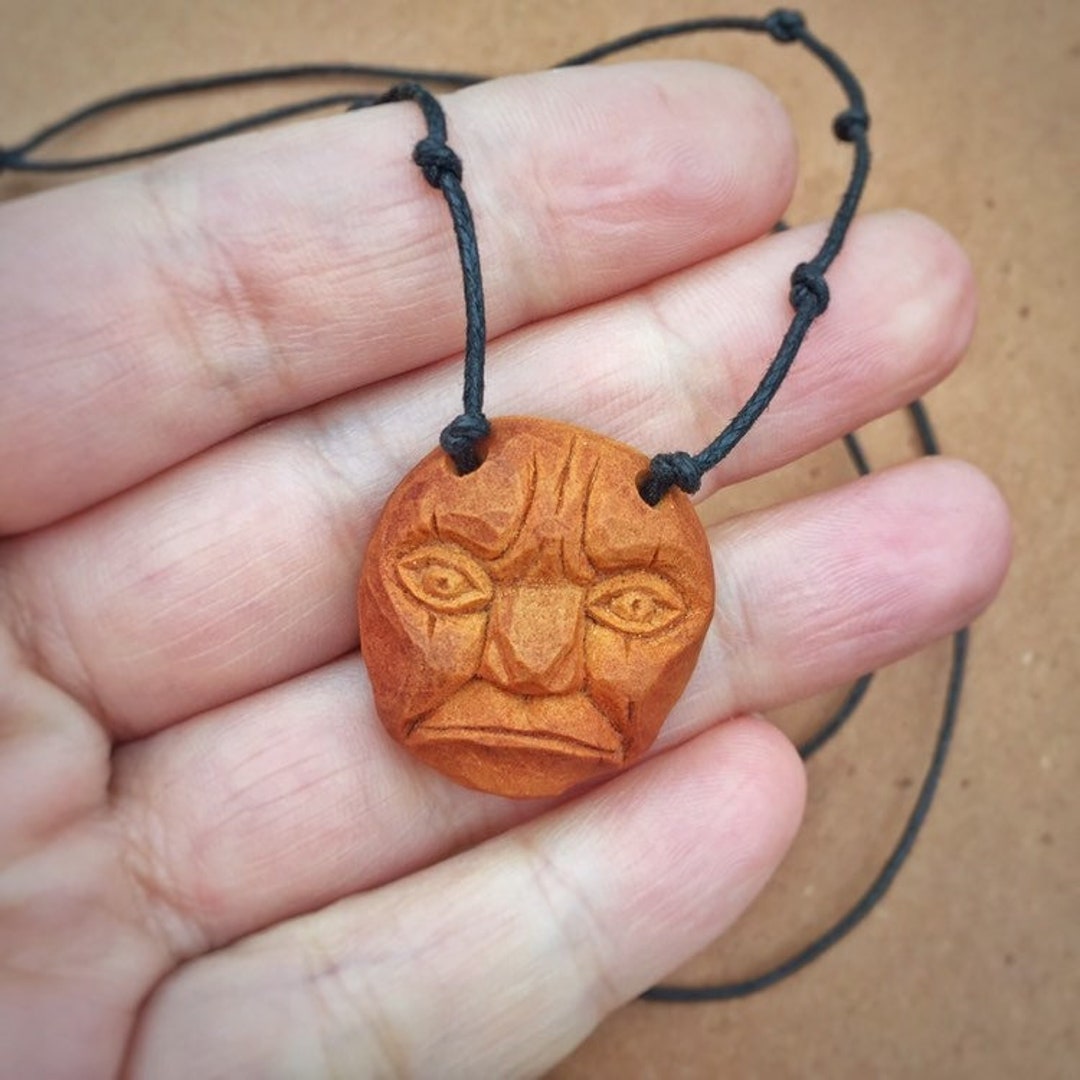 Hand Carved Avocado Stone Necklace | Angry Face Grumpy Man Face ...